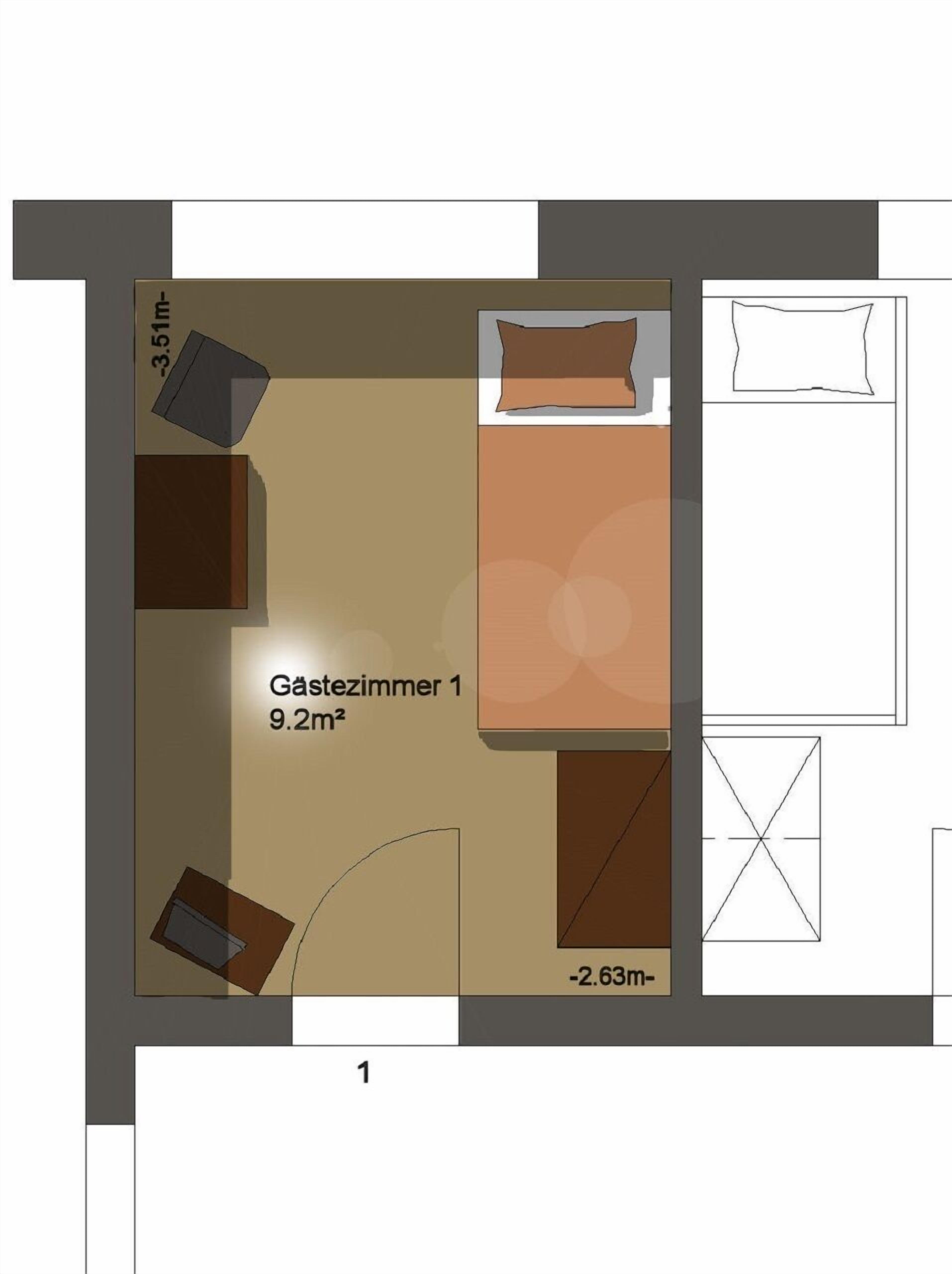 Disposição de quarto com uma cama, uma escrivaninha e uma cadeira.