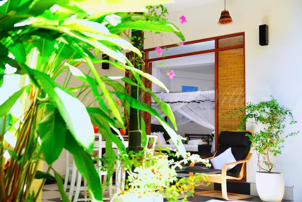 Quarto triplo luxo, várias camas, acessível, vista para o jardim | Individualmente decorados, individualmente mobiliados