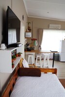 Apartamento, 1 quarto | Cozinha privada | Geladeira grande, micro-ondas, cooktop, cafeteira/chaleira