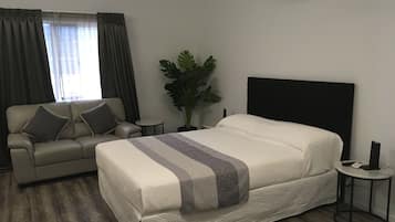 Suíte estúdio luxo, 1 cama Queen | Comodidades do quarto