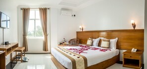 Quarto Duplo Deluxe | Minibar, secretária, Wi-fi grátis