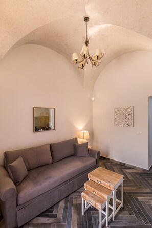 Suíte luxo | Área de estar | TV de plasma