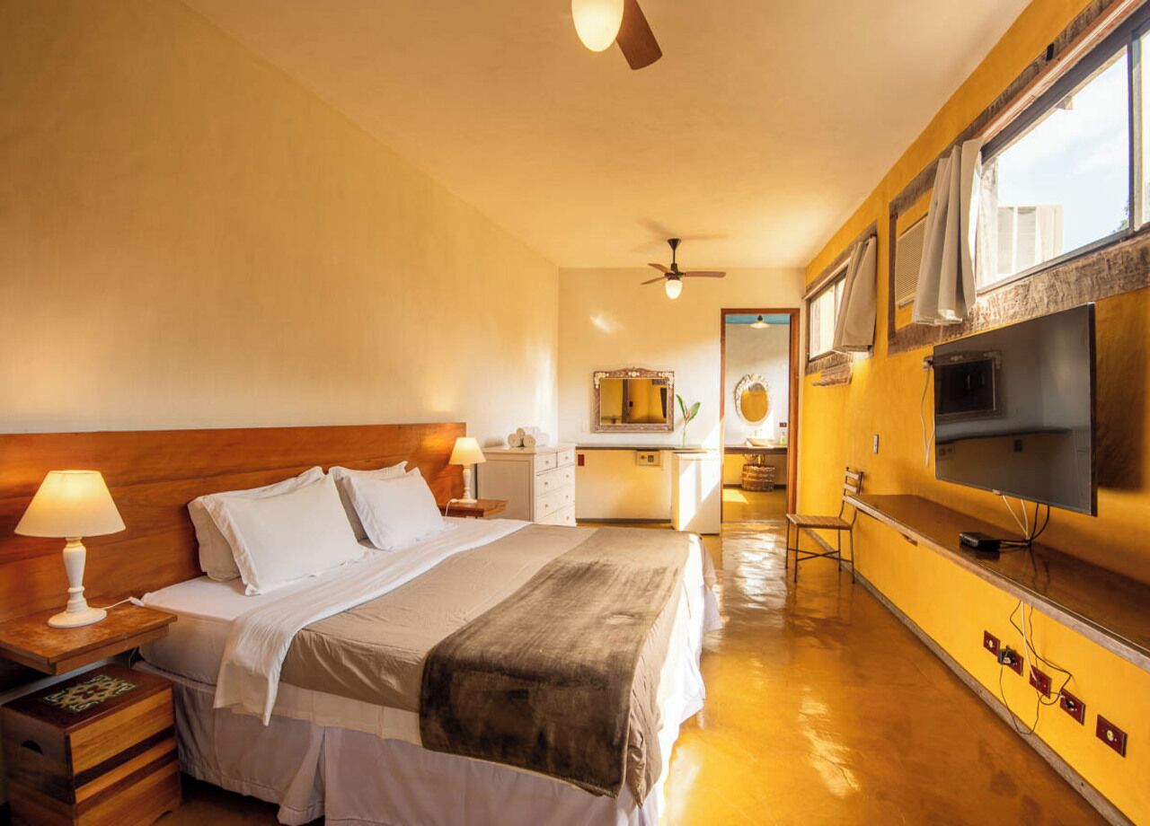 Suite Deluxe | Minibar, cofre no quarto, Wi-fi grátis, roupa de cama fornecida 