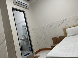 Quarto casal de uso individual | Frigobar, Wi-Fi de cortesia