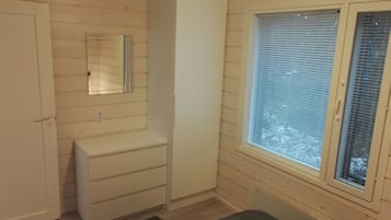 Apartamento, 2 quartos, sauna | Sala de estar | Televisor de ecrã plano de 40 polegadas com canais digitais, televisor