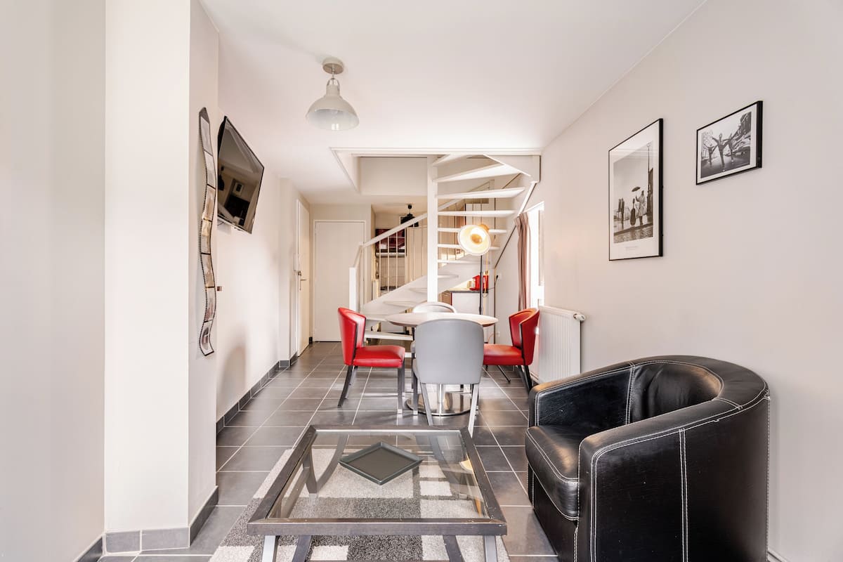 Duplex Luxe | Área de estar | TV de tela plana