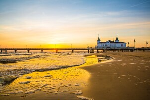 Na praia, praia de areia branca 