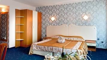 Minibar, secretária, quartos insonorizados, ferro/tábua de engomar