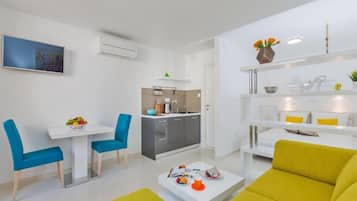 Estúdio Deluxe, terraço | 1 quarto, cofre no quarto, ferro/tábua de engomar, Wi-fi grátis