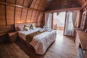 Quarto luxo, 1 cama Queen, sacada | Vista do quarto