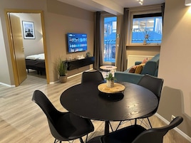 Apartamento conforto | Área de estar | TV de tela plana