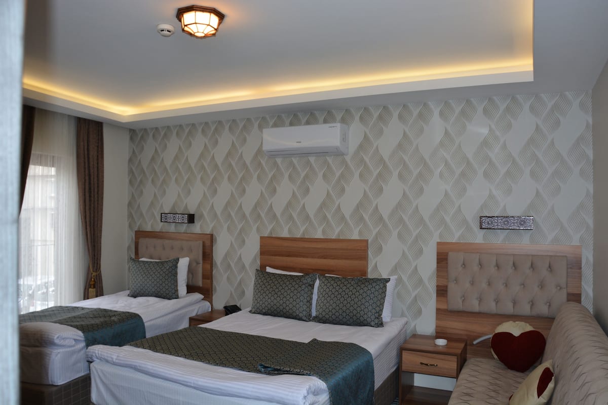 Quarto família | 1 quarto, cofres nos quartos, Wi-Fi de cortesia, roupa de cama