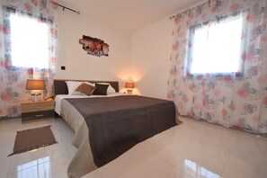 Apartamento, 2 quartos, no piso térreo | Berços grátis, Wi-Fi de cortesia, roupa de cama