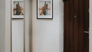Apartamento superior | Área de estar | TV de tela plana
