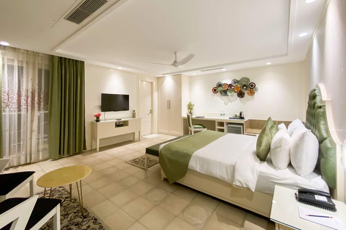 Quarto superluxo | Frigobar, escrivaninha, quartos à prova de som, Wi-Fi de cortesia