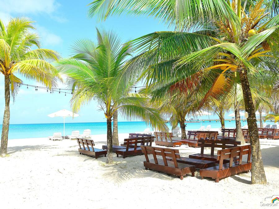 Na praia, voleibol de praia, bares na praia, caiaque