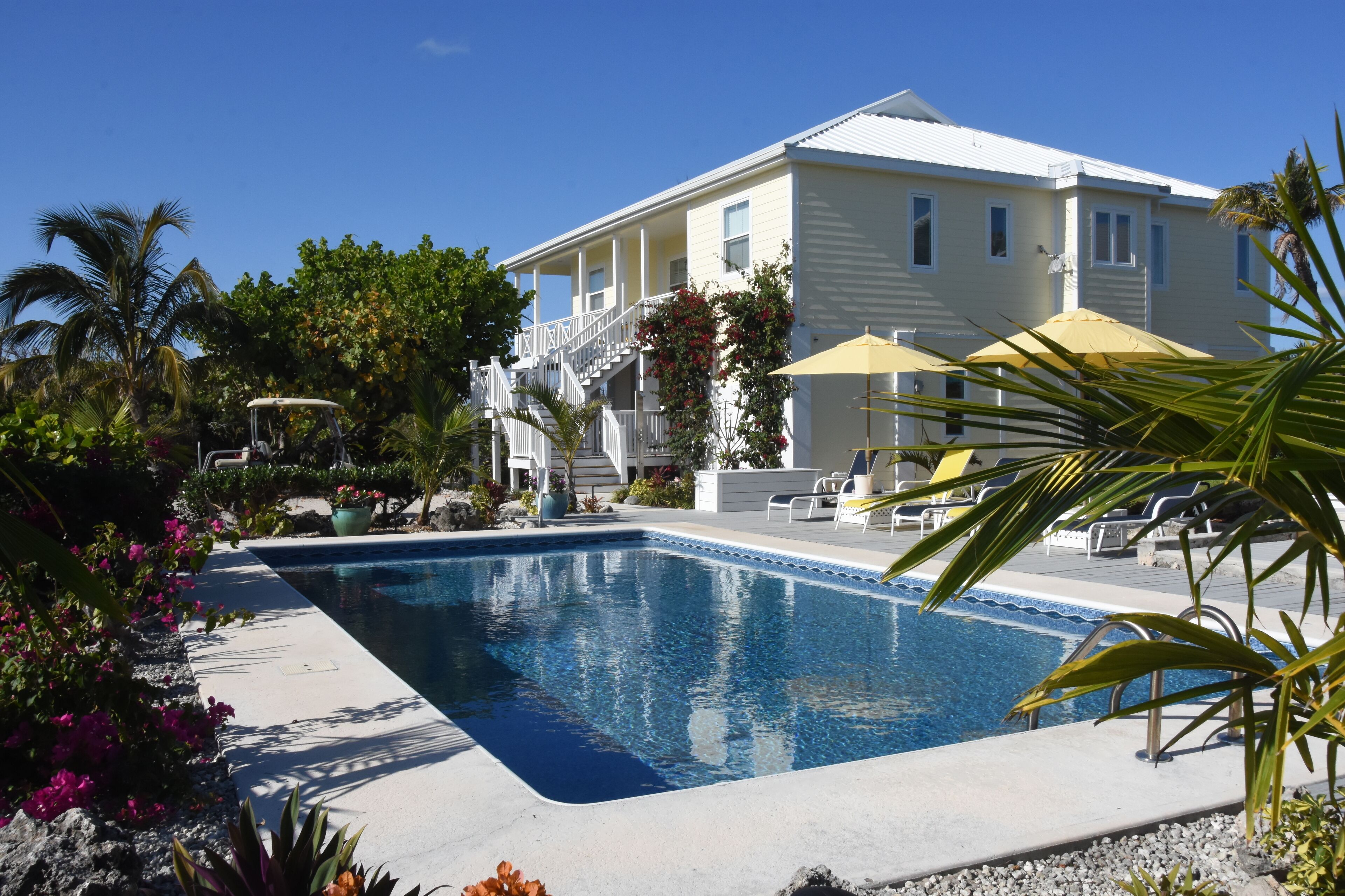 Coco Nut Tree House is nestled in Tropical Foliage on Crystal Clear Sea ...