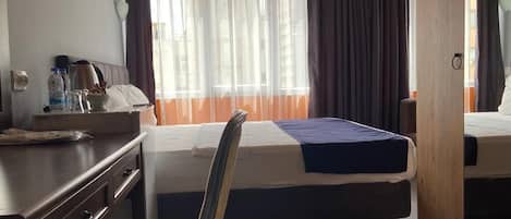 Estúdio standard, 1 quarto | Roupas de cama premium, quartos à prova de som, Wi-Fi de cortesia