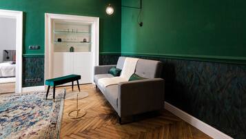 Apartamento, 2 quartos | Sala de estar | TV