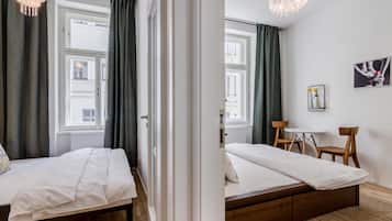 Apartamento urbano | Cortinas blackout, ferros/tábuas de passar roupa, Wi-Fi de cortesia