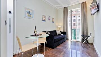 Quarto Familiar | Sala de estar | TV de ecrã plano