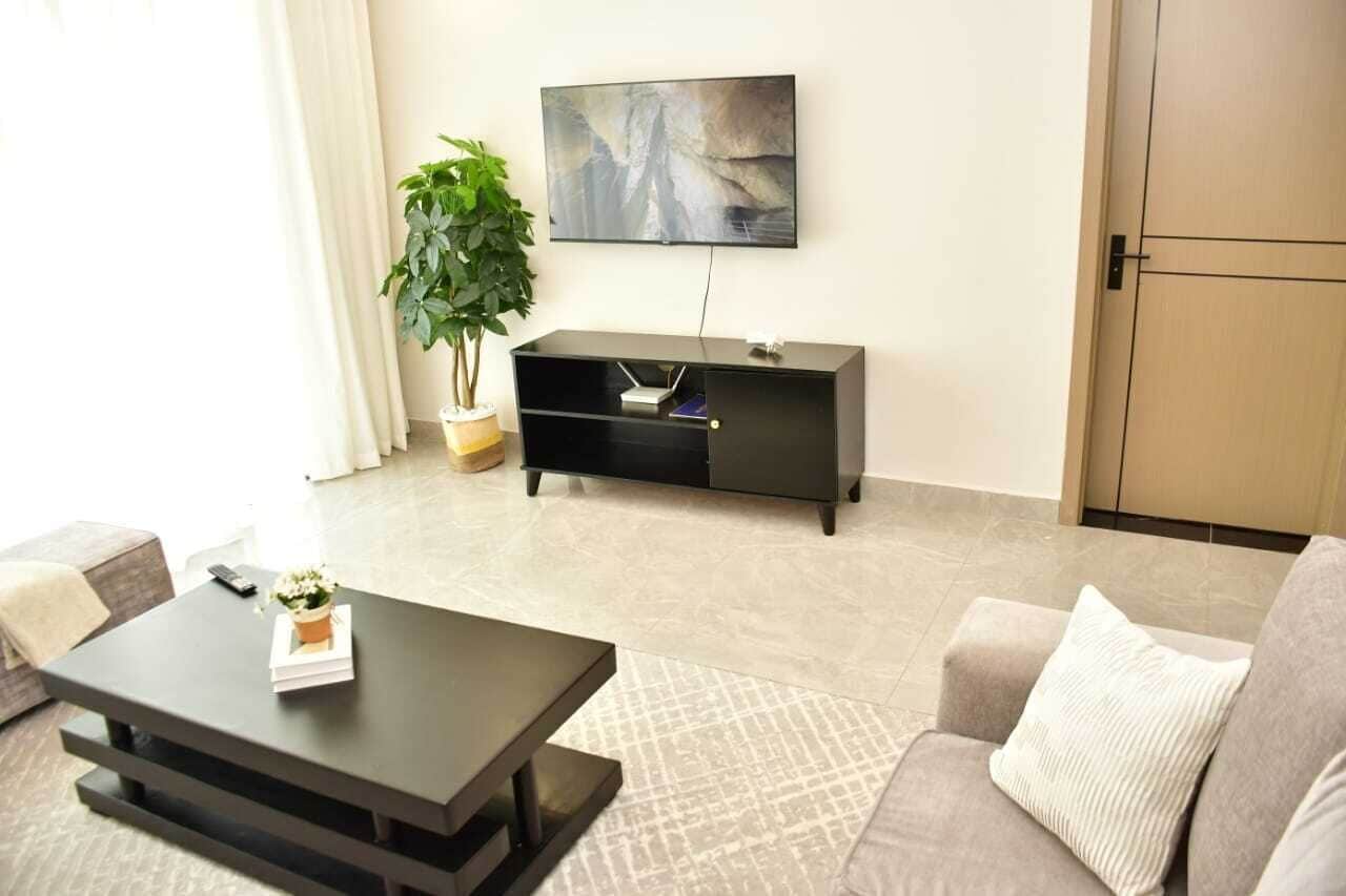 Apartamento, 2 quartos, varanda | Sala de estar | Smart TV de 43 polegadas com canais digitais, Netflix 