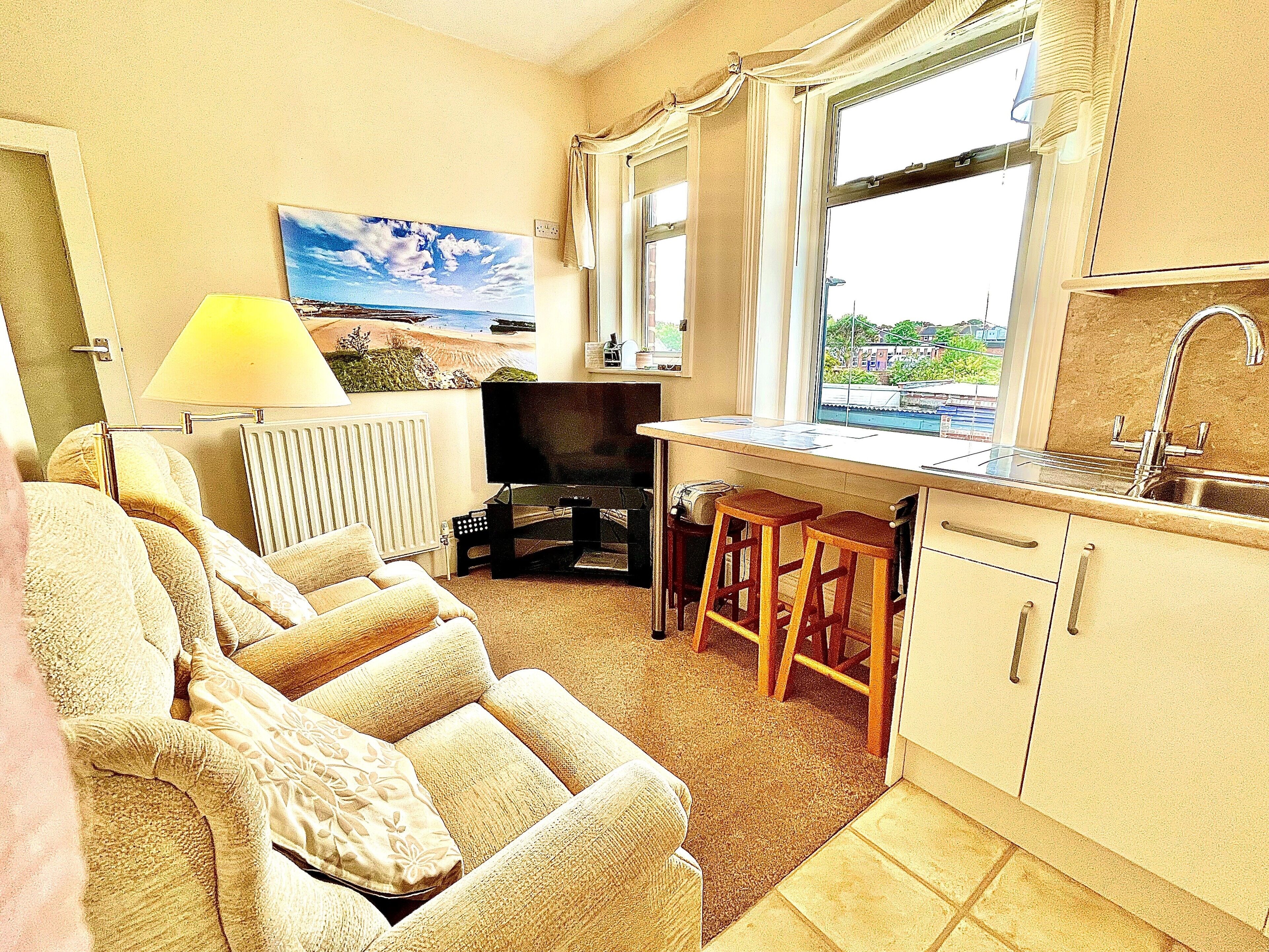 Apartamento conforto, suíte, vista para o jardim (2) | Lounge