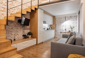 Apartamento | Cofres nos quartos, cortinas blackout, quartos à prova de som