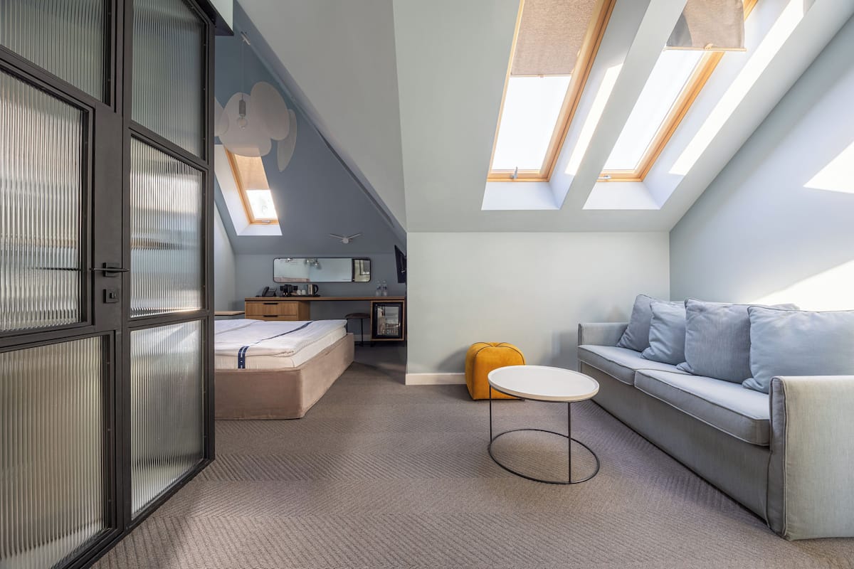 Suite Júnior | Cofre no quarto, cortinas/cortinados opacos, quartos insonorizados