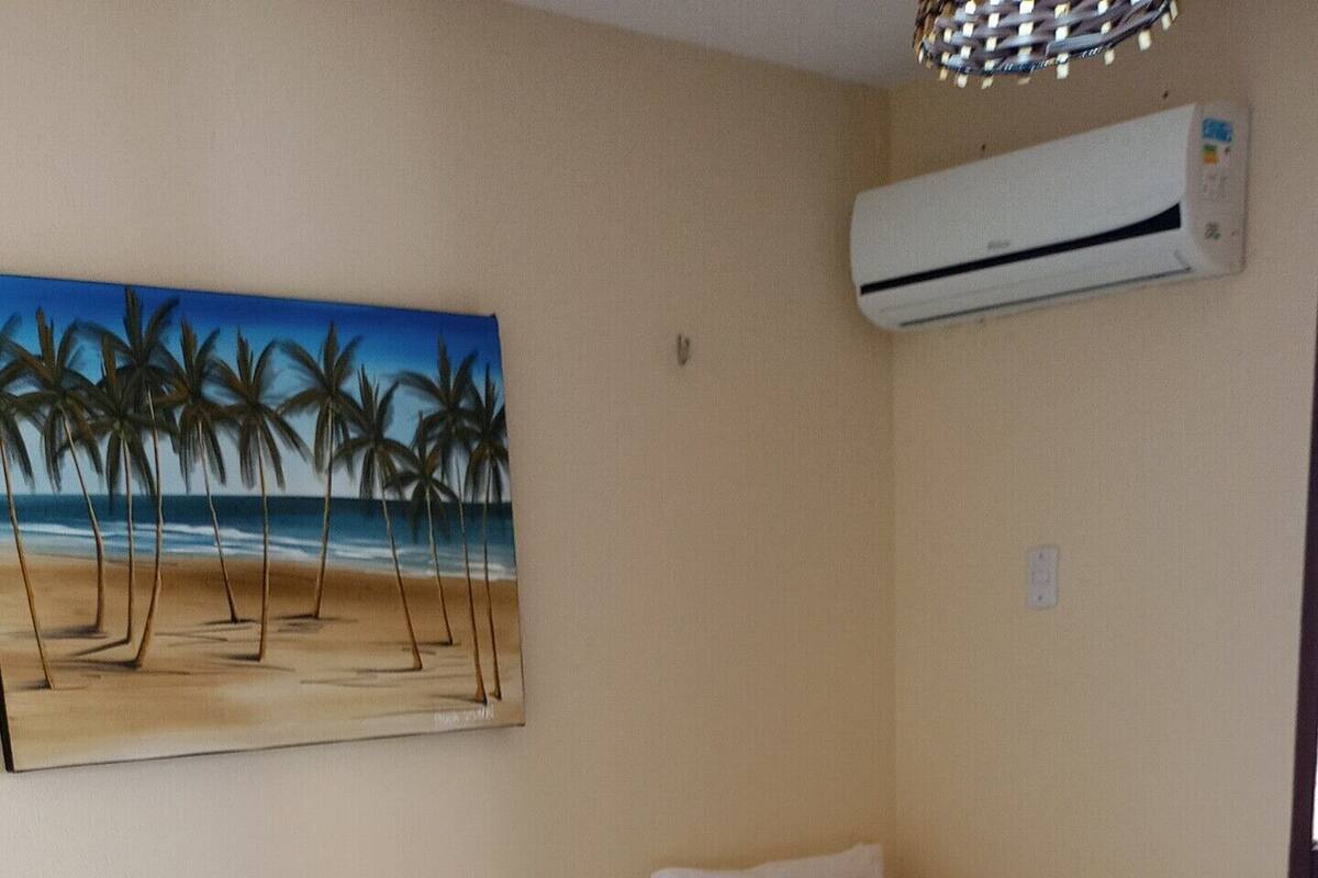 Quarto Triplo Comfort | Minibar, cortinas/cortinados opacos, ferro/tábua de engomar 