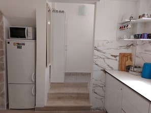 Estúdio | Cozinha privada | Geladeira, micro-ondas, fogão, cooktop