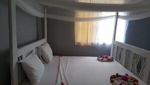 Quarto quádruplo luxo, vista para o mar