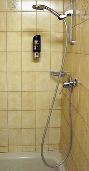Banheira, toalhas de banho