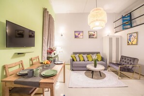 Apartamento Gallery, 1 quarto | Sala de estar | TV plasma 