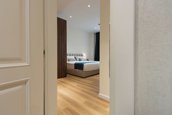 Deluxe King Suite | 1 quarto, roupa de alta qualidade, cofre no quarto, secretária