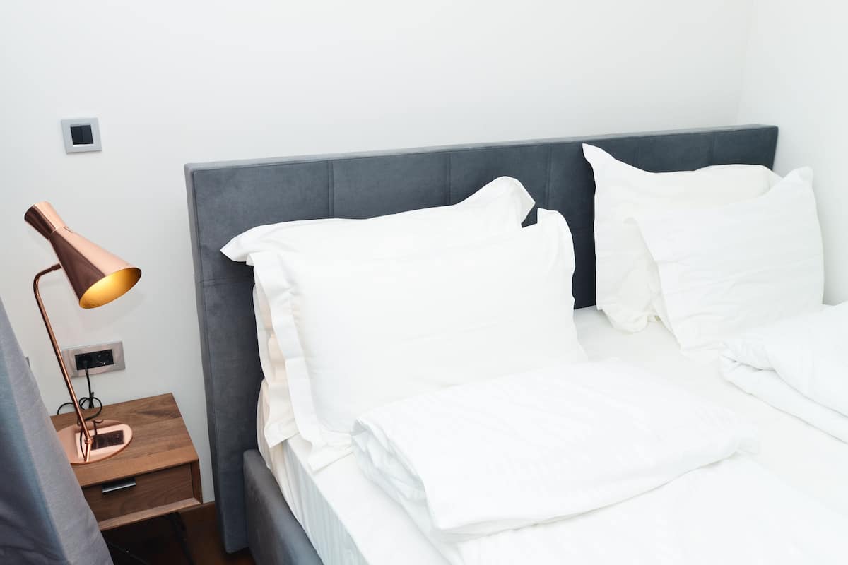 Apartamento luxo, vista para a cidade | Ferros/tábuas de passar roupa, berços grátis, Wi-Fi de cortesia