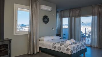 Loft, 2 quartos | 2 quartos, ferros/tábuas de passar roupa, Wi-Fi de cortesia