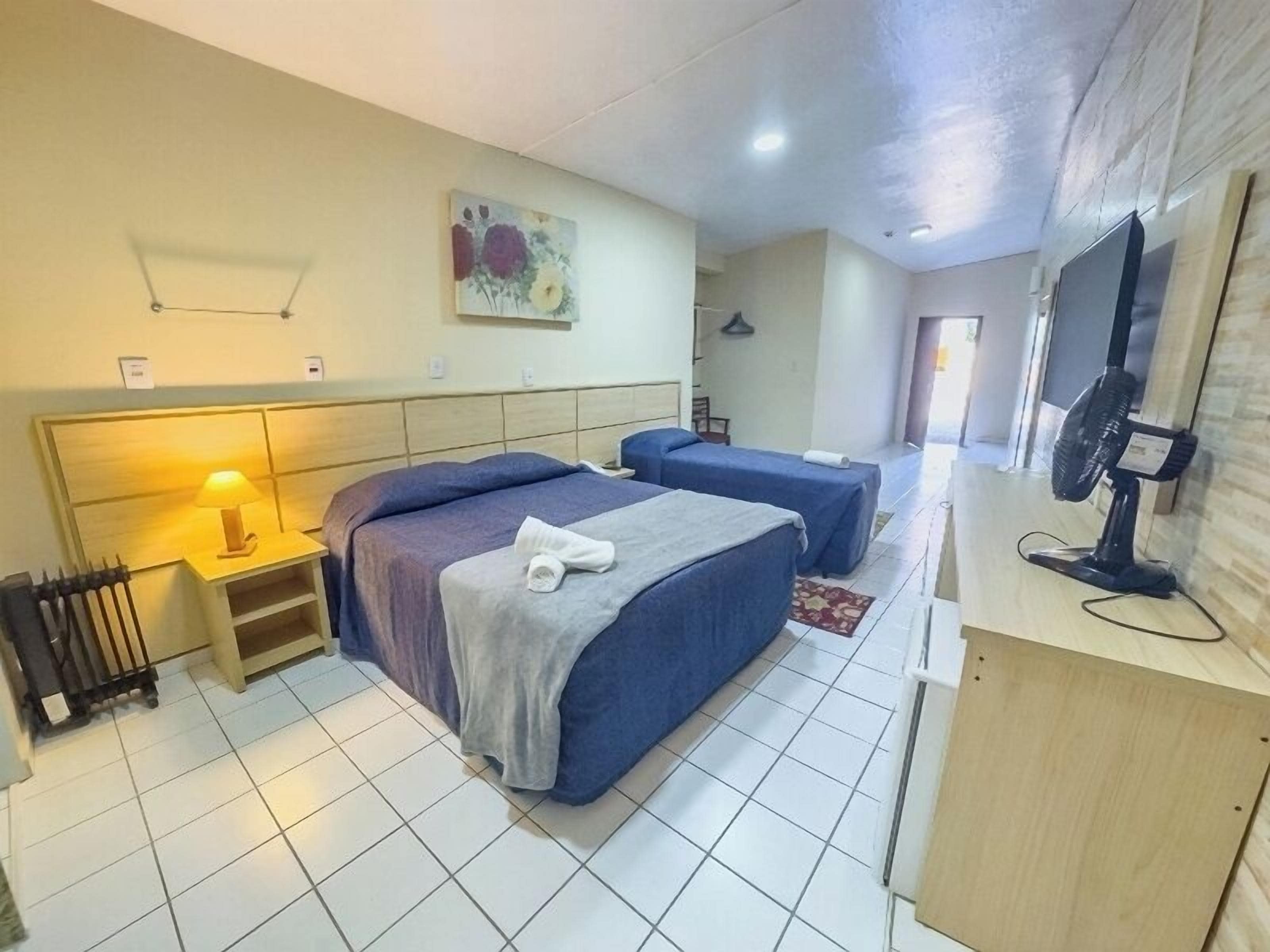 Quarto Económico, no edifício anexo | Minibar, Wi-fi grátis, roupa de cama fornecida 