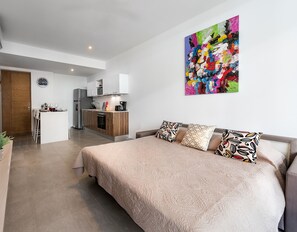 Apartamento, 1 quarto | 2 quartos, individualmente decorados, individualmente mobiliados