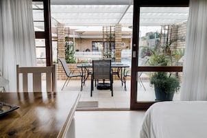 Quarto conforto | Vista para o jardim