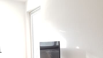 Apartamento, 2 quartos | 2 quartos, secretária, quartos insonorizados, ferro/tábua de engomar