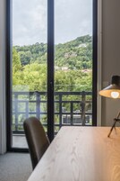 Quarto Duplo Premium, varanda, vista para o jardim | Vista do quarto