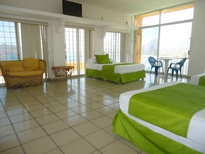Quarto luxo, várias camas, para não fumantes, vista para o oceano | Roupa de cama