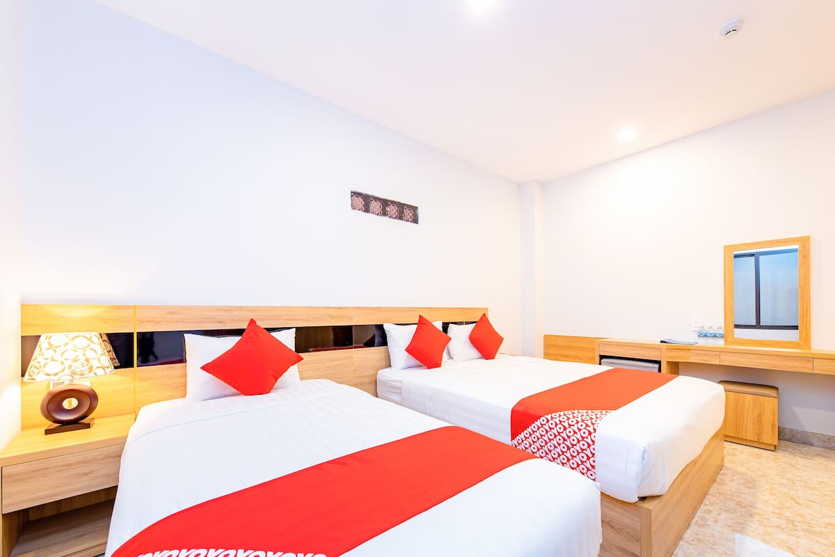 Quarto triplo superior | Frigobar, escrivaninha, Wi-Fi de cortesia, roupa de cama