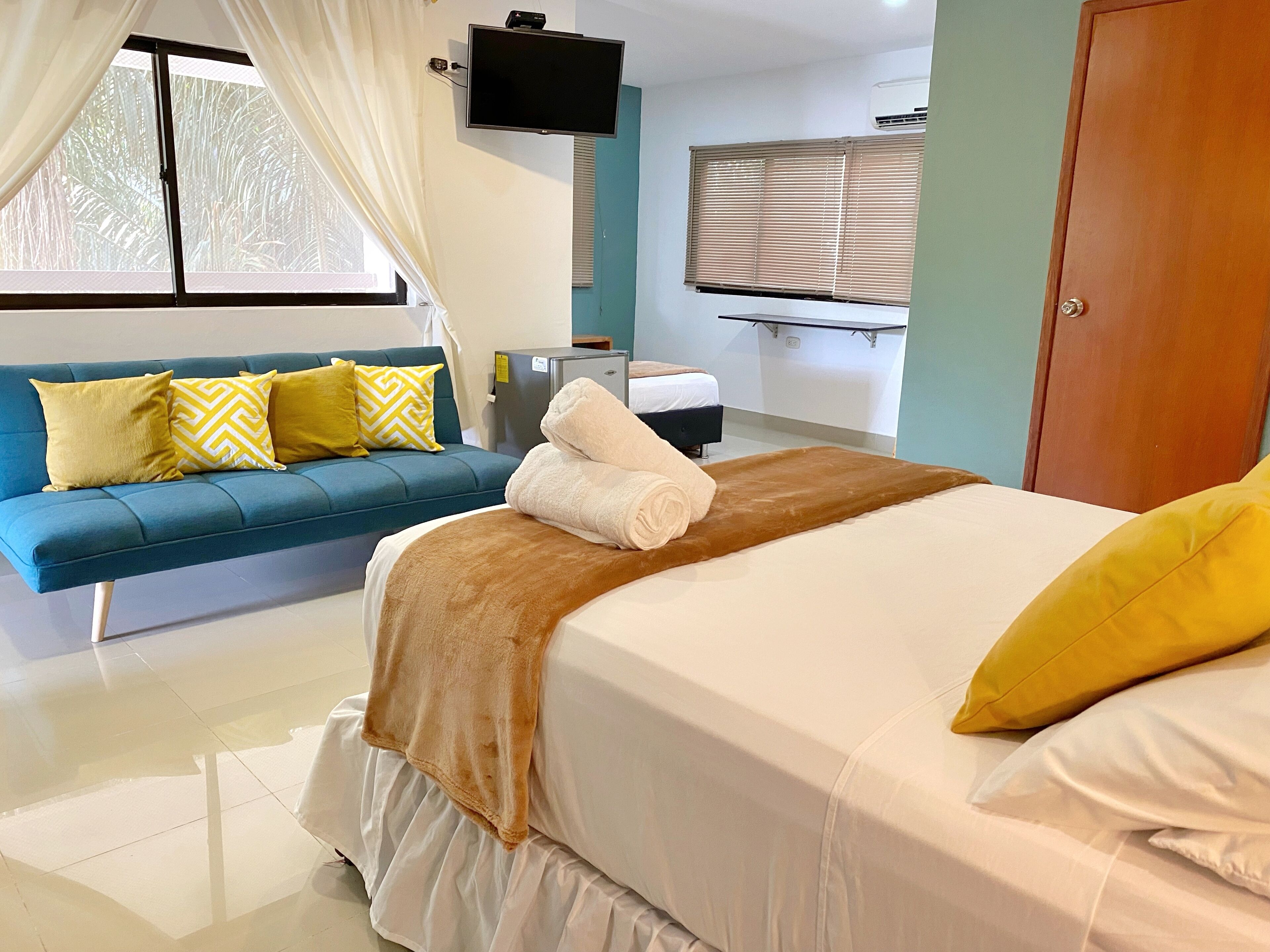 Quarto Familiar (Quintuple) | Roupa de alta qualidade, minibar, cortinas/cortinados opacos 