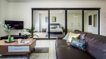 Apartamento, 1 quarto (A) | Sala de estar | Smart TV de 40 polegadas com canais por cabo, televisor 