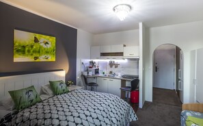 Apartamento standard | Cozinha privada | Geladeira, micro-ondas, cooktop, lava-louças