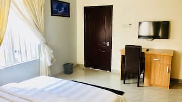Suíte executiva | 1 quarto, cofres nos quartos, escrivaninha, Wi-Fi de cortesia