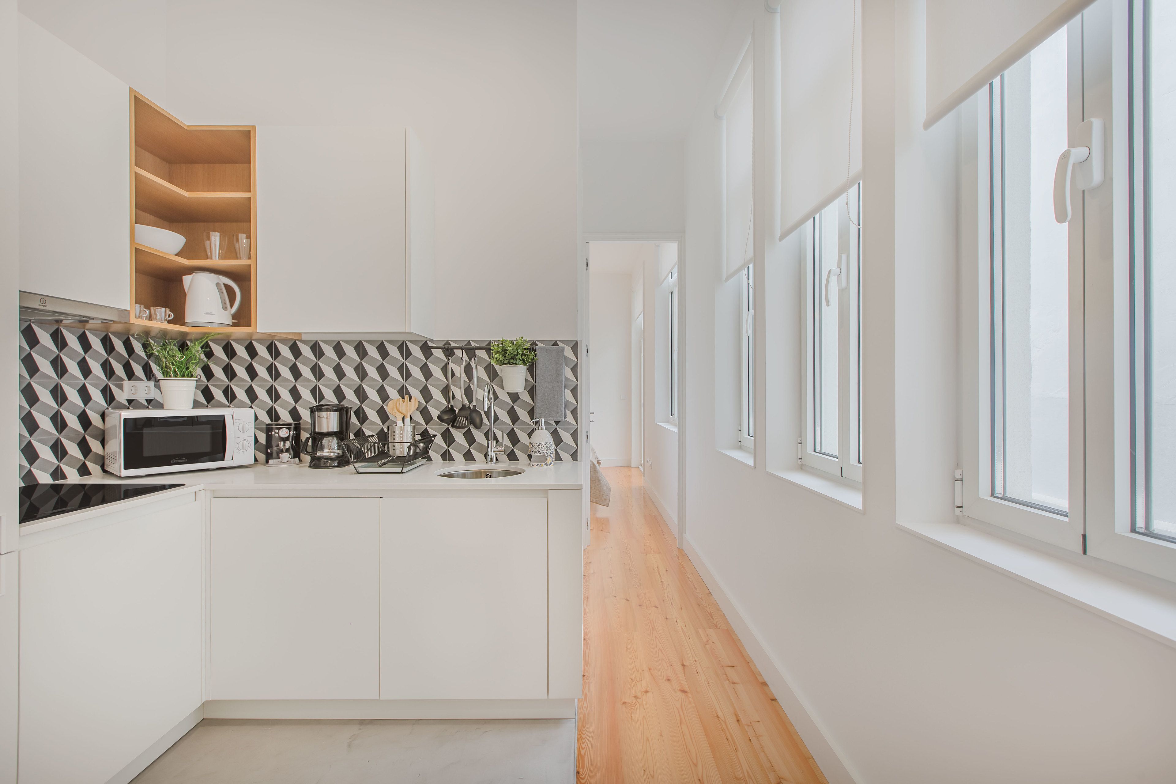 Apartamento, 1 quarto | Cozinha privada | Um frigorífico/congelador grande, um micro-ondas, uma placa de cozinha 