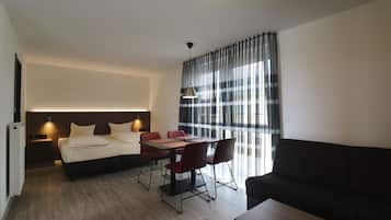 Comfort Appartement | Área de estar | TV de tela plana